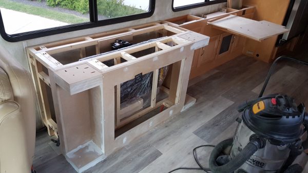 RV Media Center with Fireplace and TV Lift - Explorking