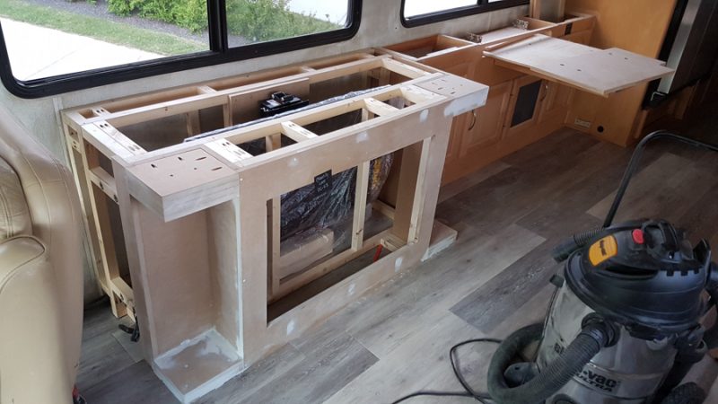 RV Media Center with Fireplace and TV Lift - Explorking