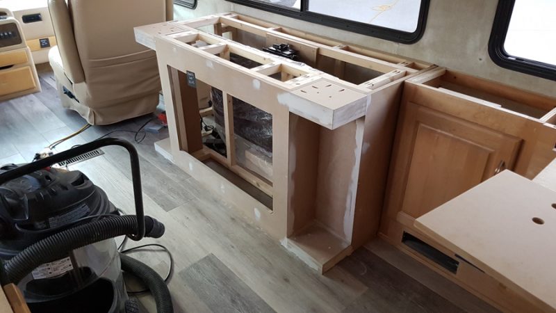 RV Media Center with Fireplace and TV Lift - Explorking